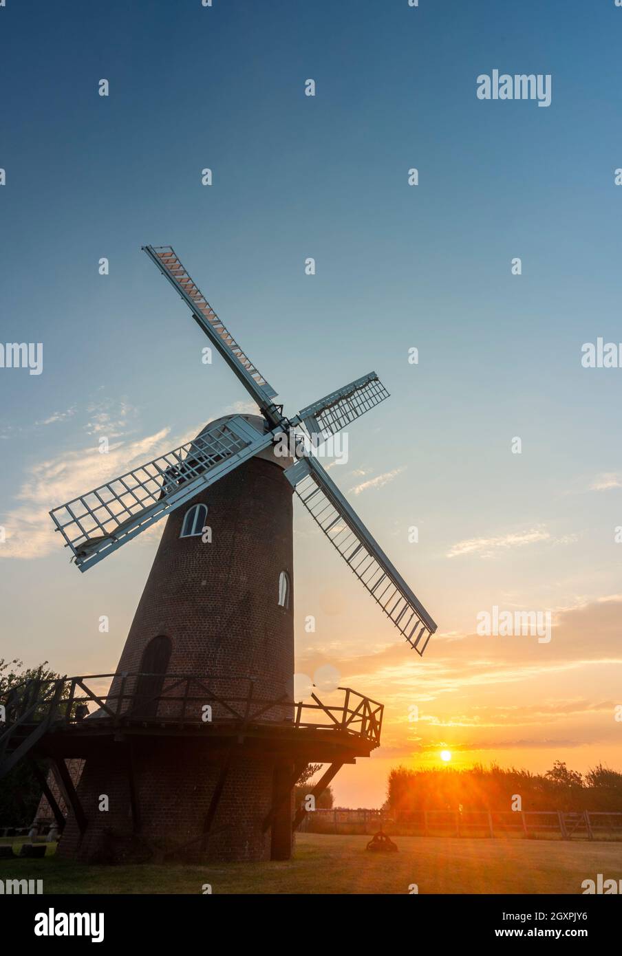 Dawn at a renovated 19th century windmill,maintained by a team of ...
