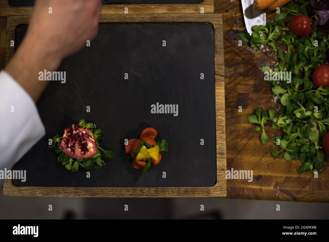 top view of Chef hands in hotel or restaurant kitchen serving beef ...