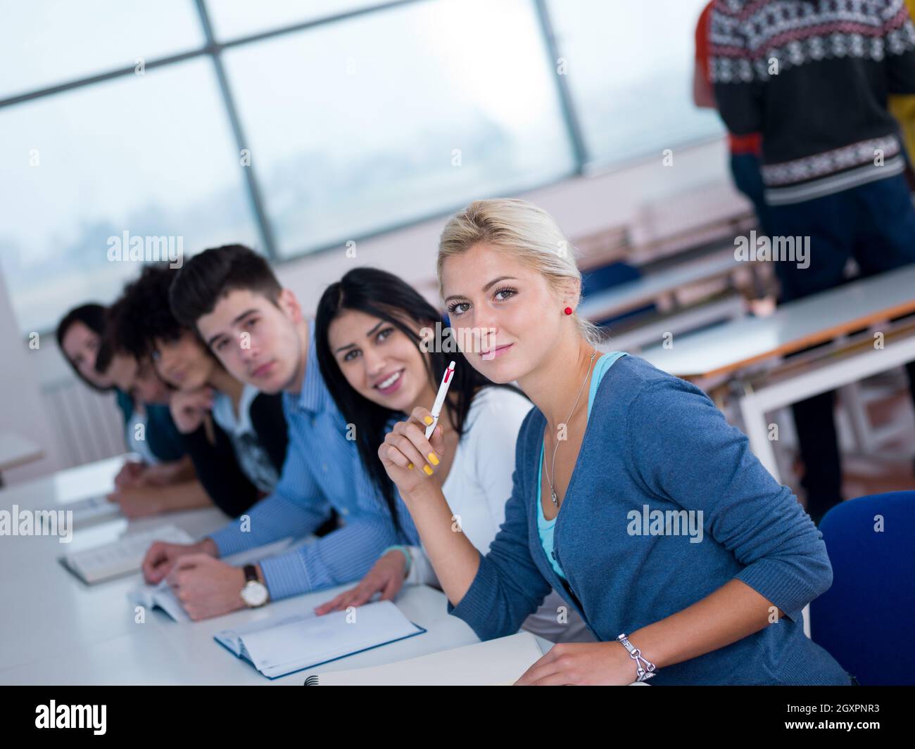 happy students group study in classroom Stock Photo - Alamy