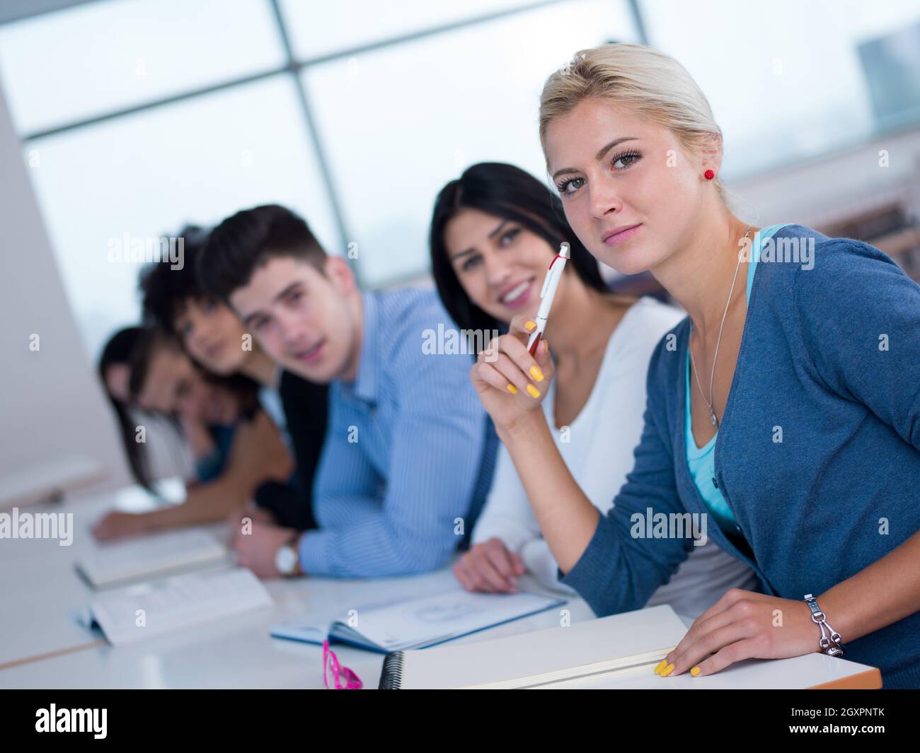 happy students group study in classroom Stock Photo - Alamy