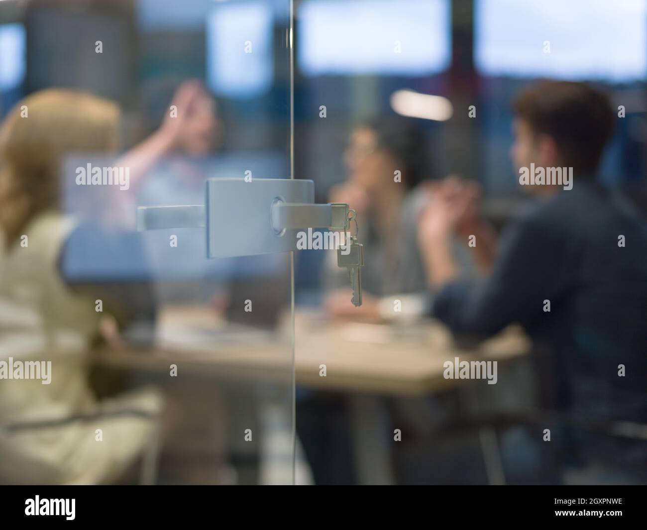 Open glass door with keys, key in keyhole Stock Photo - Alamy