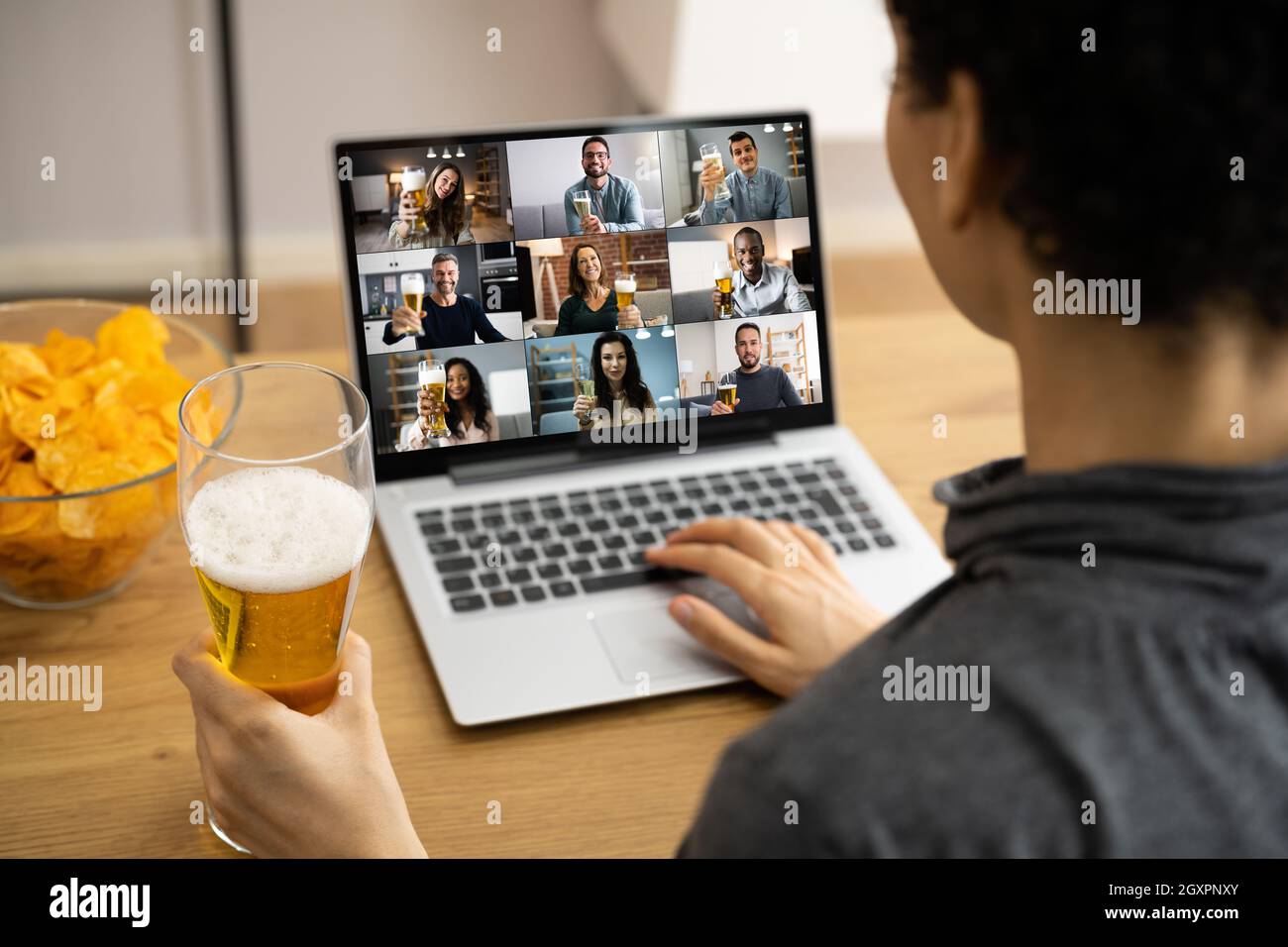 Virtual Beer Drink Online Party Using Laptop Stock Photo - Alamy