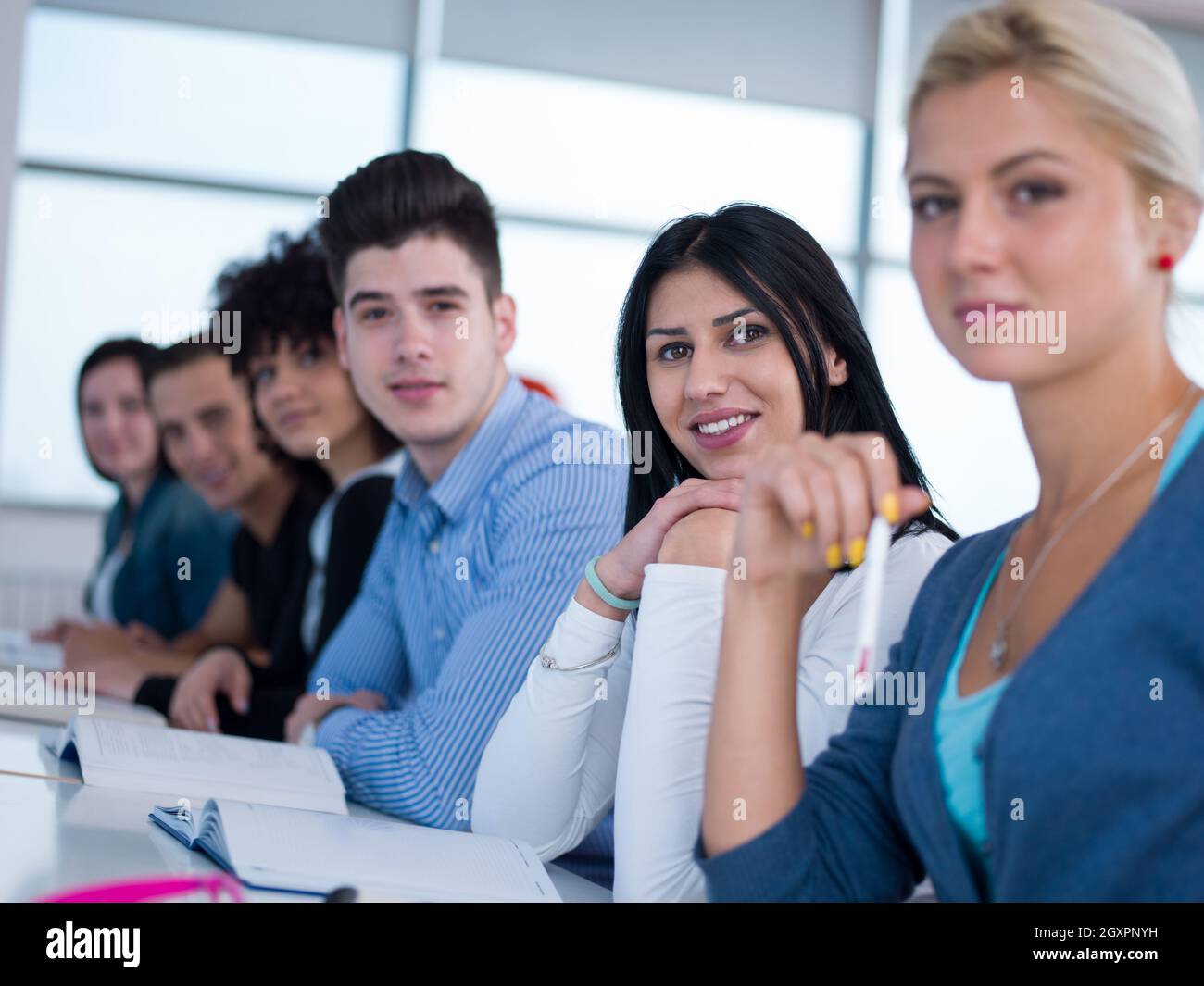 happy students group study in classroom Stock Photo - Alamy