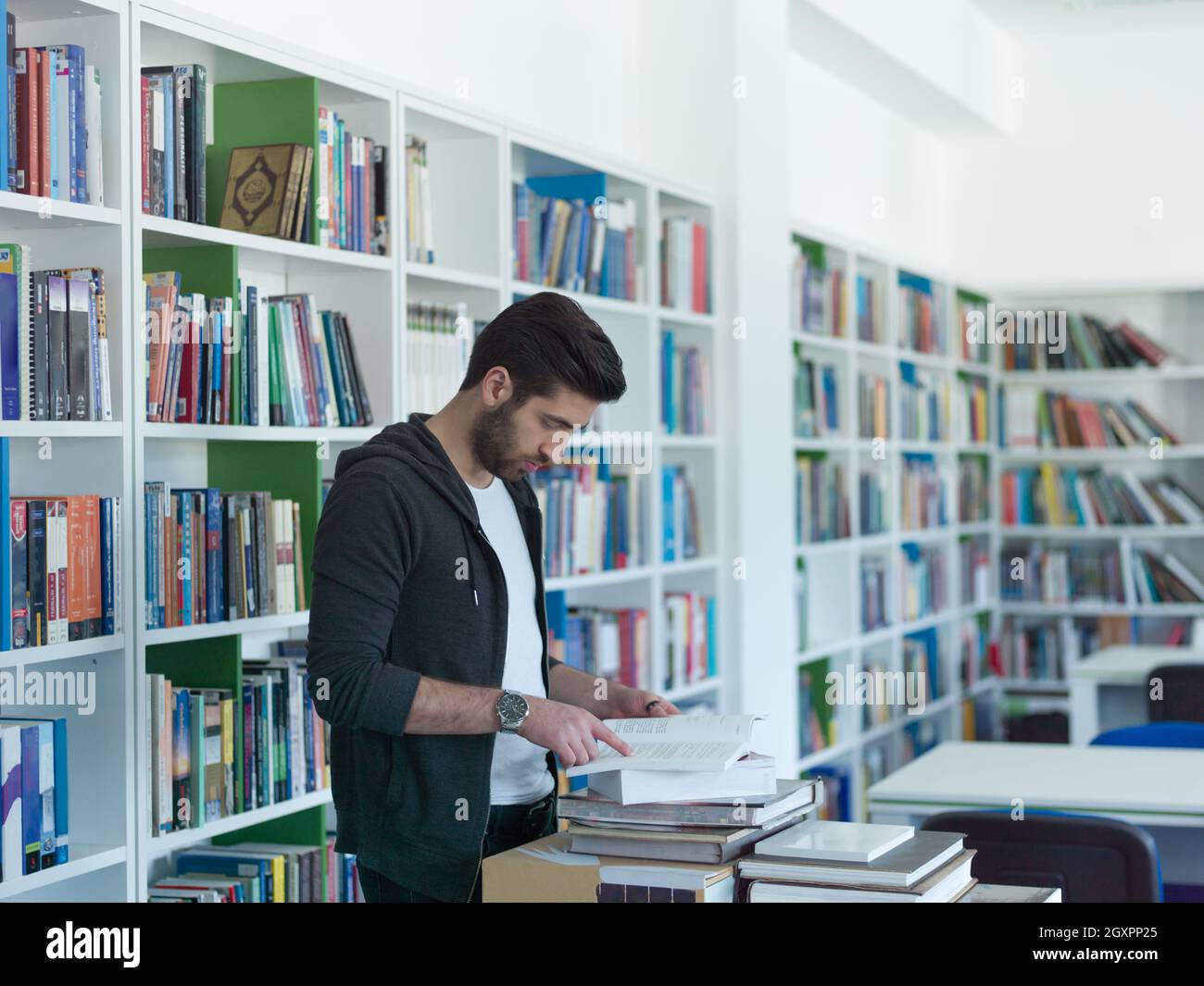 portrait of student in collage school library, arab youth learning and ...
