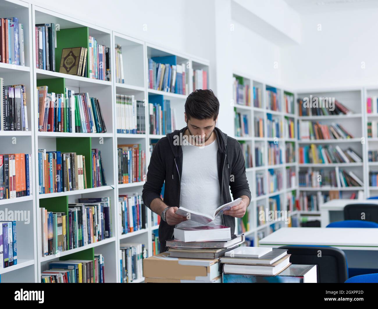 portrait of student in collage school library, arab youth learning and ...