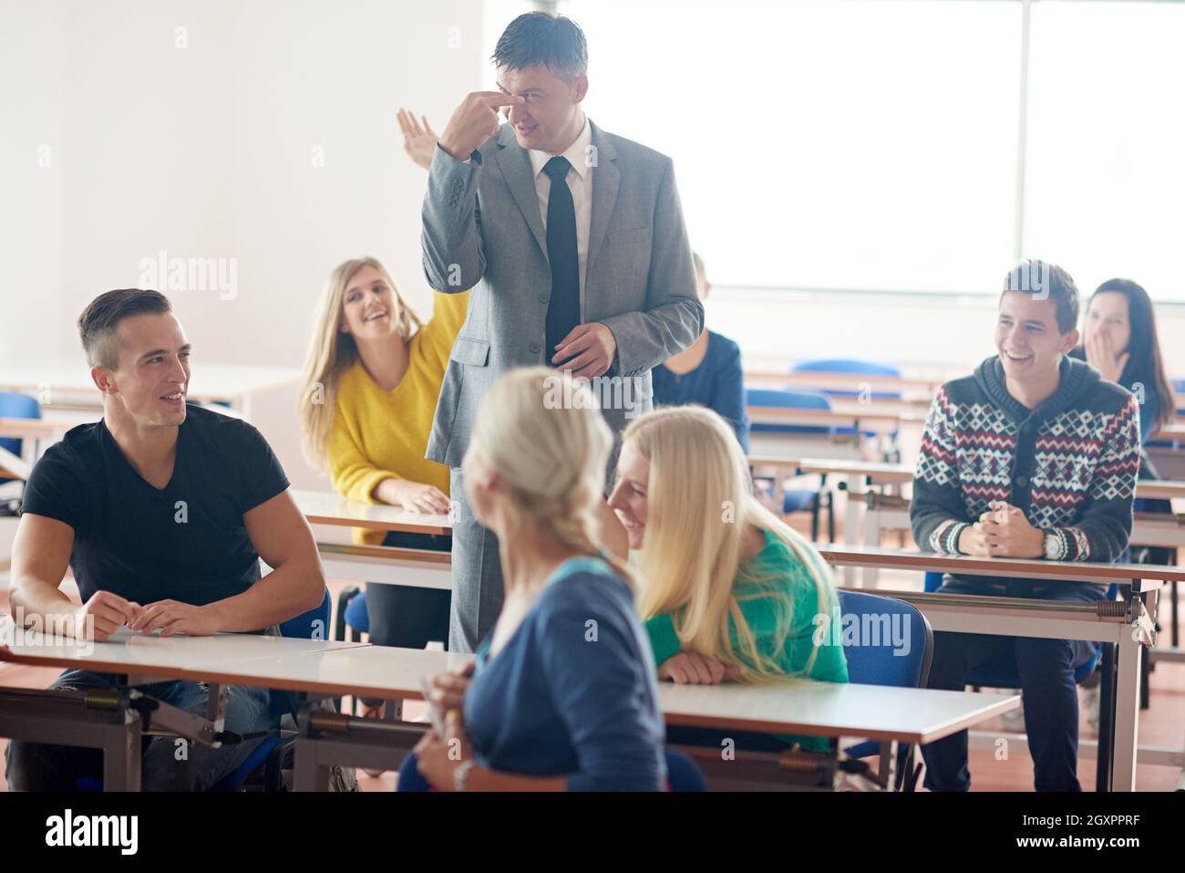 group of students with teacher on class learning lessons Stock Photo ...