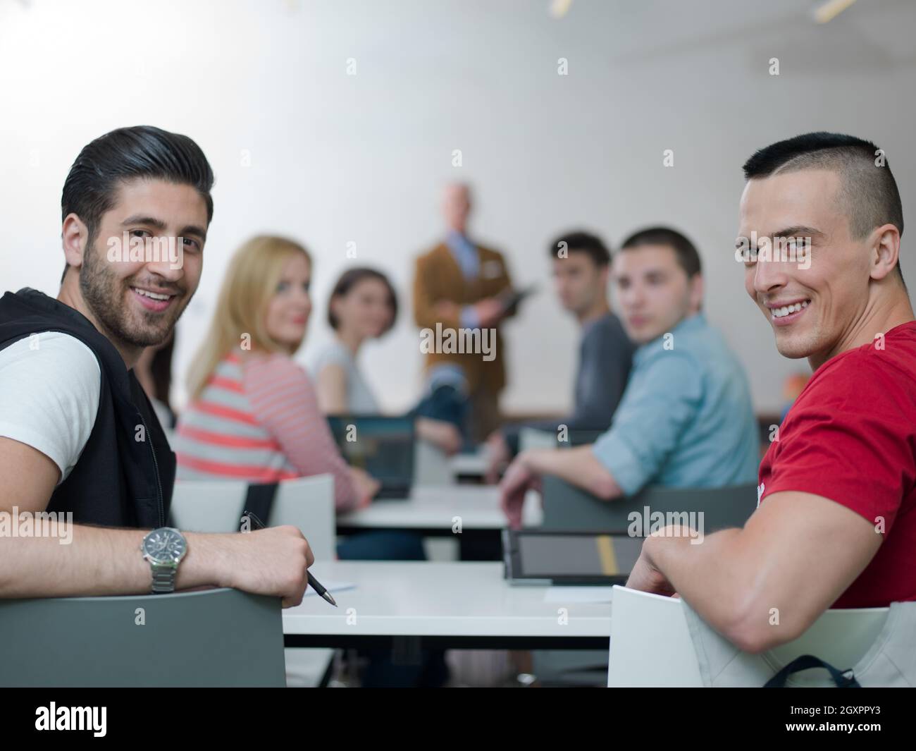 group of students study with senior professor in modern school ...