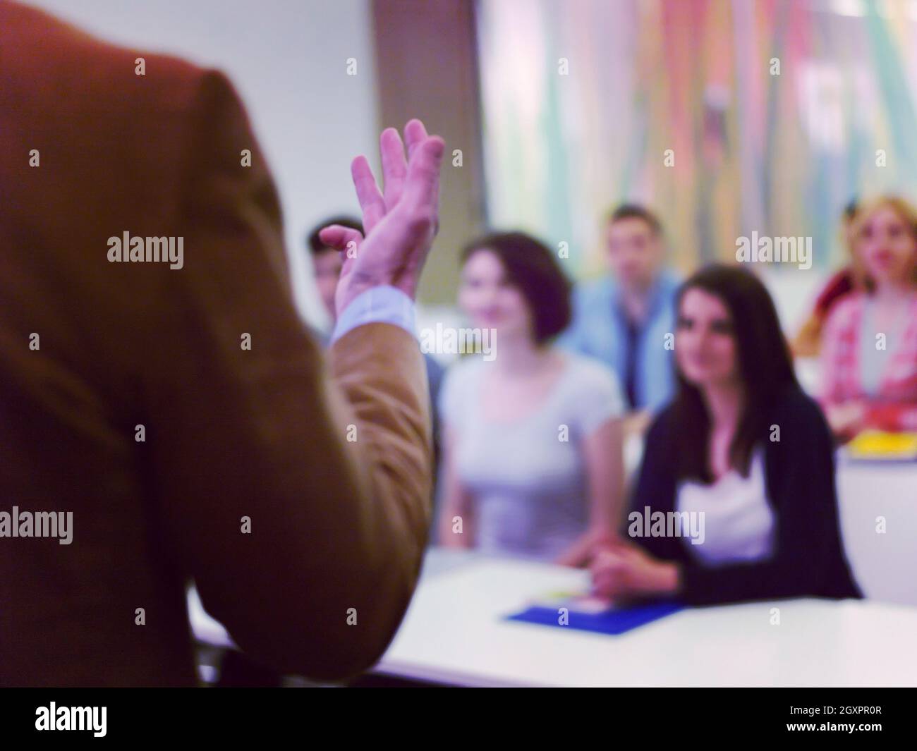 close up of teacher hand with marker while teaching lessons in school ...