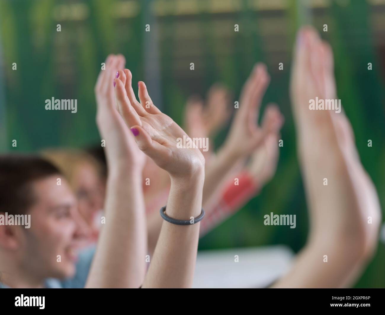 senior teacher teaching lessons, smart students group raise hands up in ...
