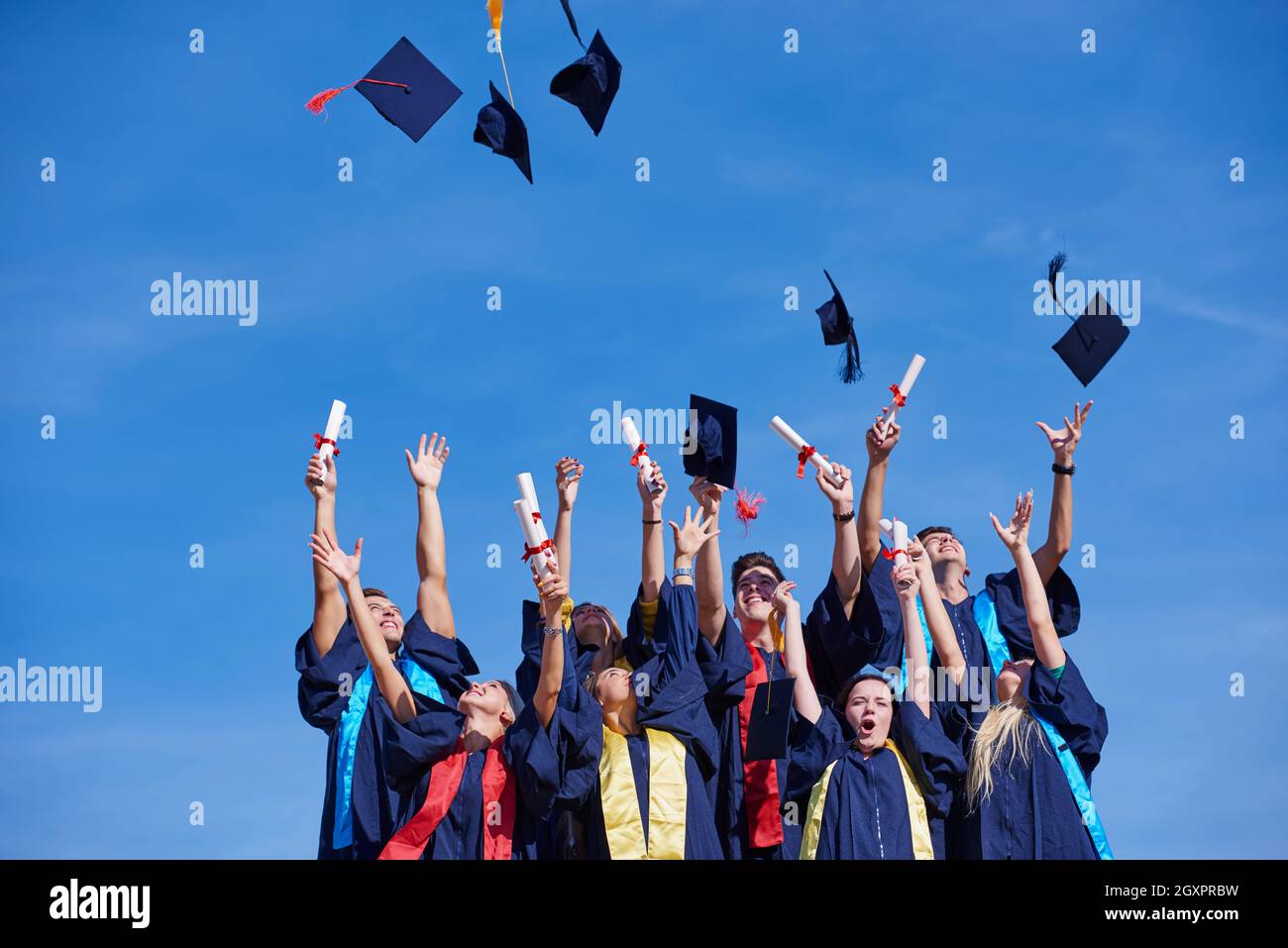Graduate throwing hats cloud hi-res stock photography and images - Alamy