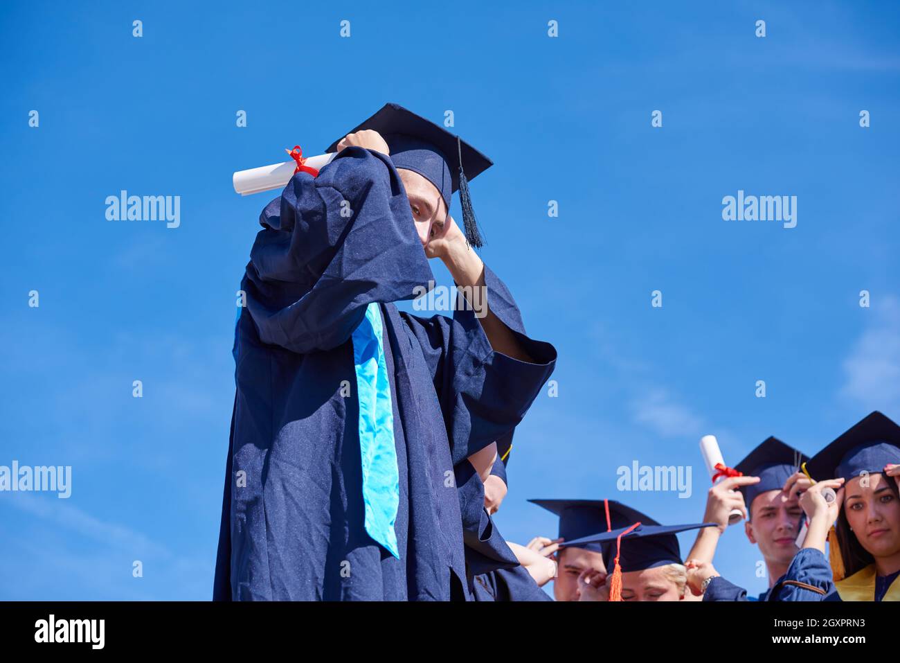 young graduates students group standing in front of university building ...