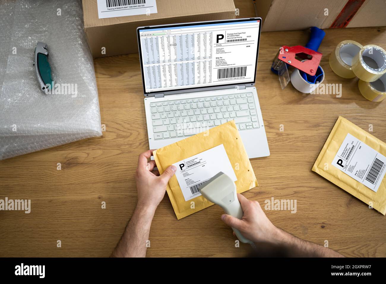 Person Packaging Orders For Online Business And Using Barcode Scanner ...