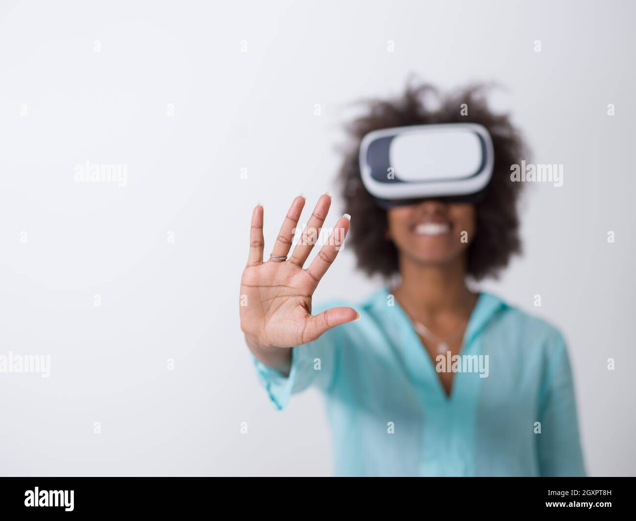 Happy african american girl getting experience using VR headset glasses ...