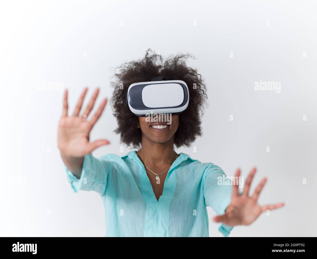 Happy african american girl getting experience using VR headset glasses ...