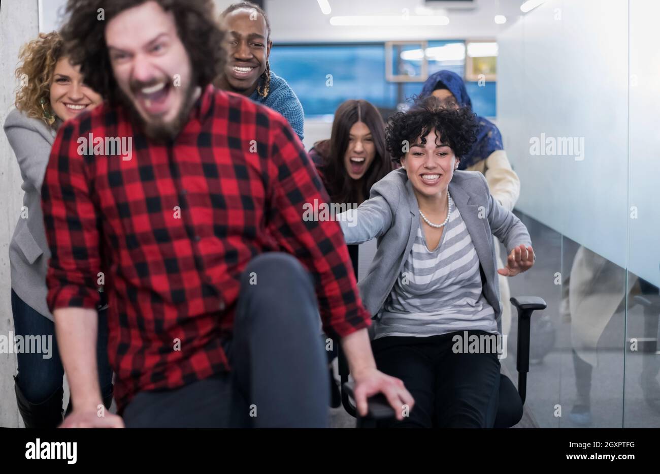 multiethnics startup business team of software developers having fun ...