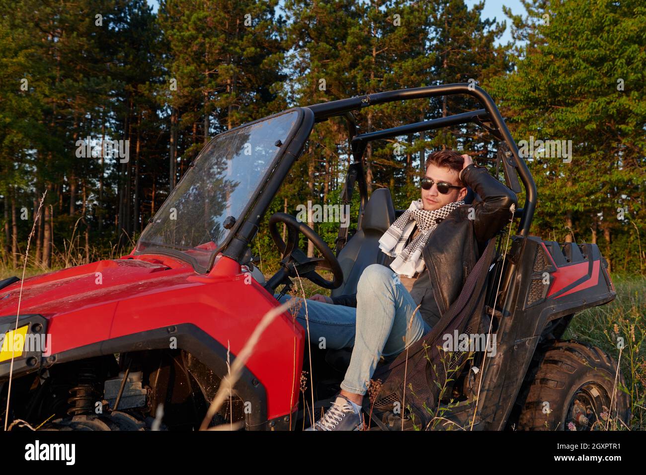 portrait of young happy excited man enjoying beautiful sunny day while ...