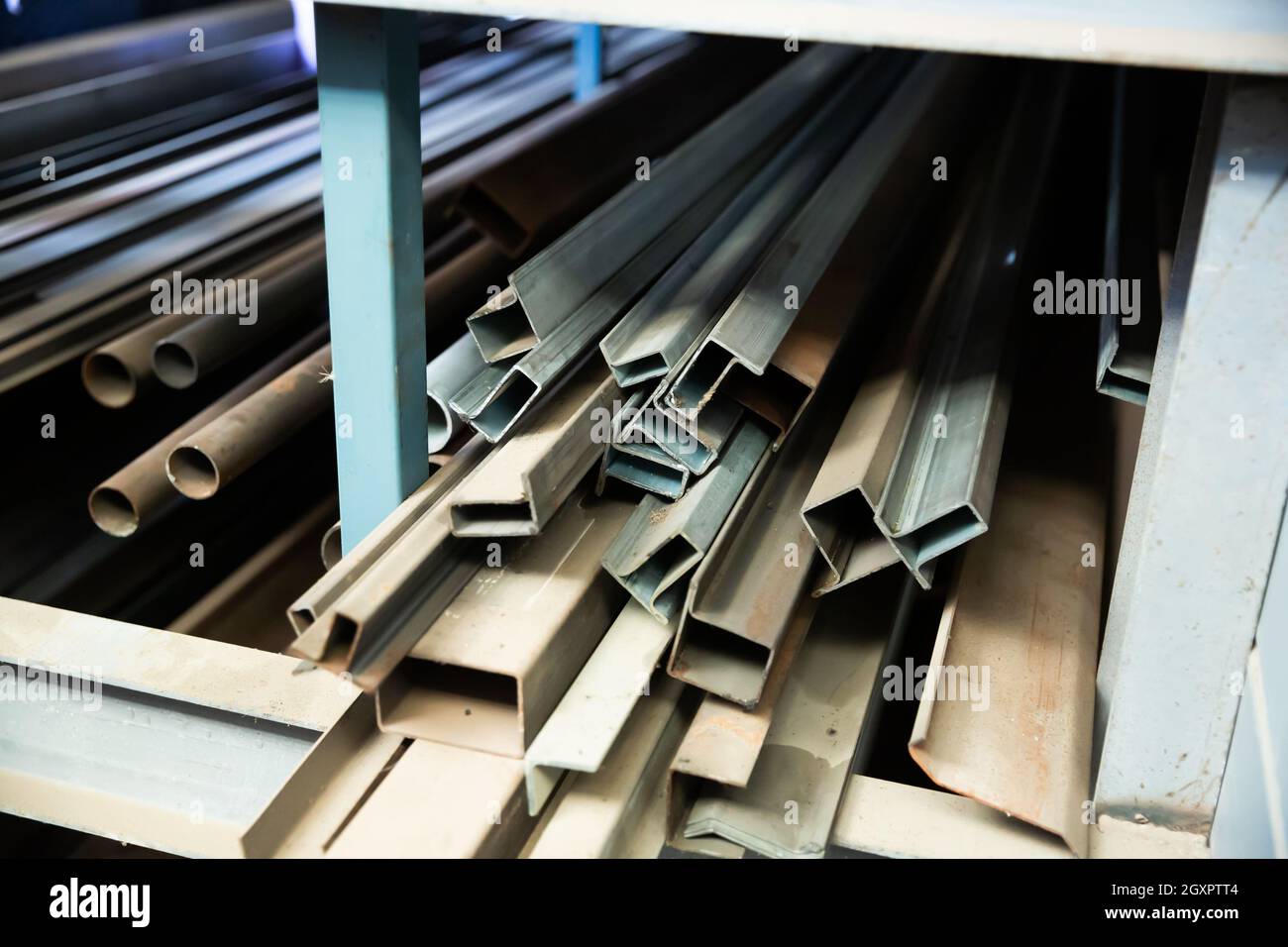 Stack of different metal pipes Stock Photo - Alamy