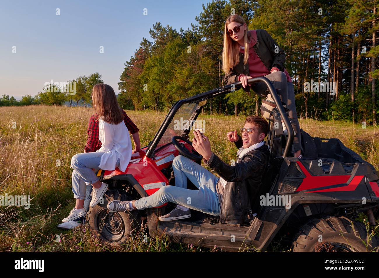 portrait of group young happy people enjoying beautiful sunny day while ...