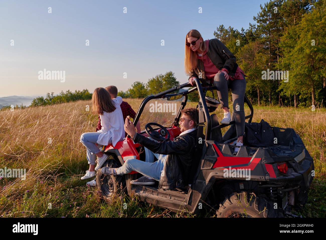 portrait of group young happy people enjoying beautiful sunny day while ...