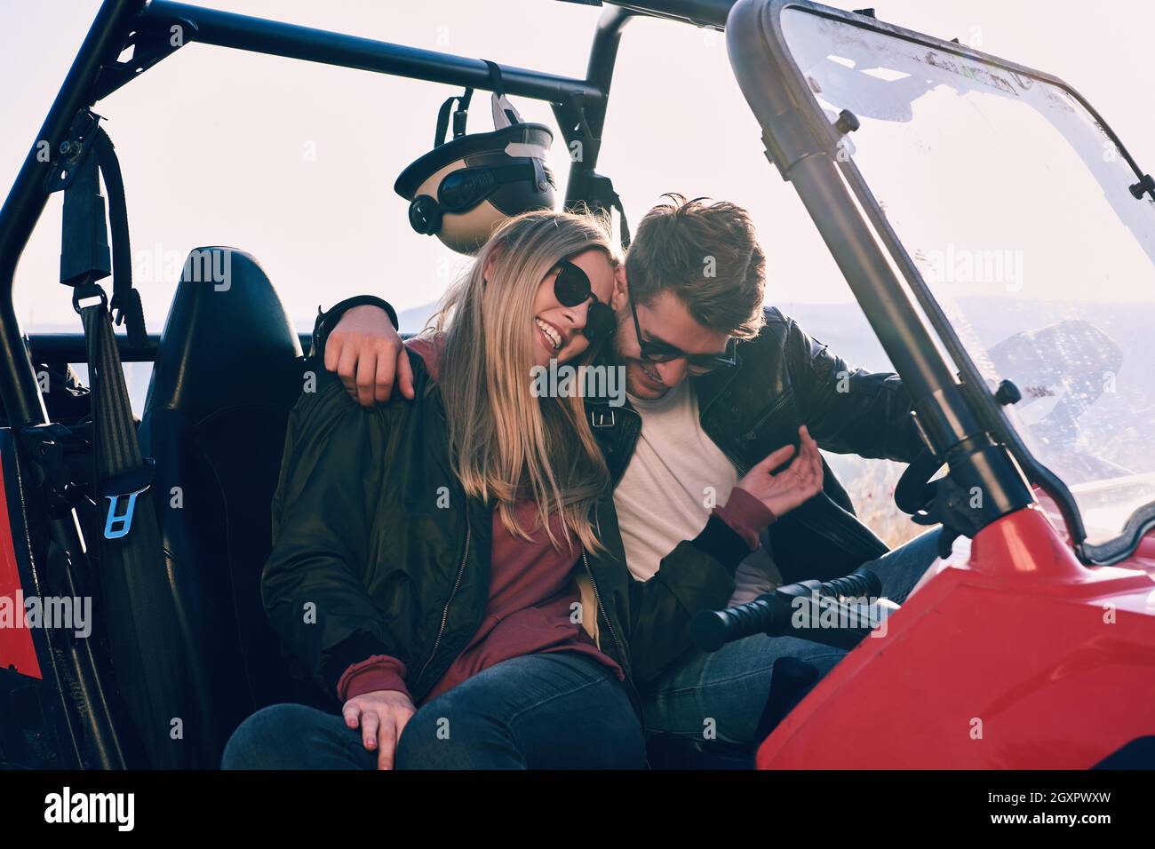 portrait of young happy excited couple enjoying beautiful sunny day ...