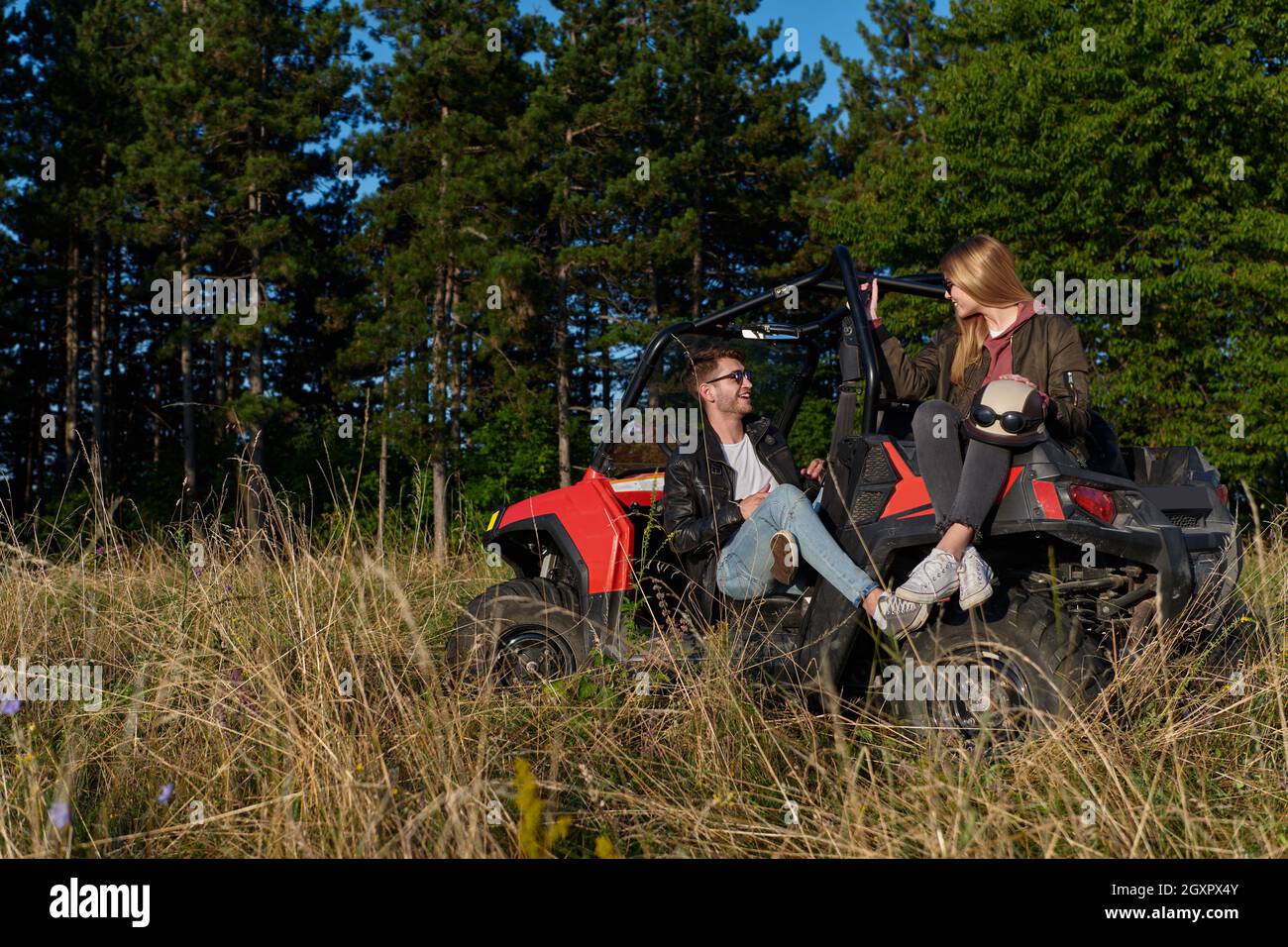 portrait of young happy excited couple enjoying beautiful sunny day ...
