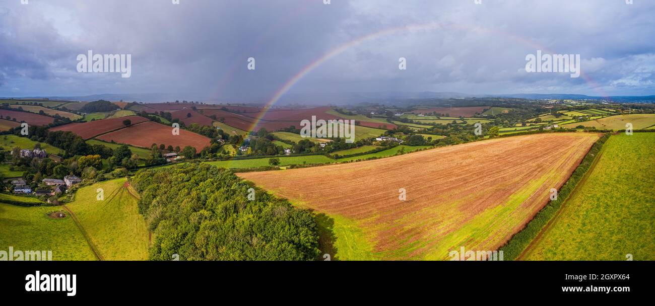 Rainbow over the Fields over Compton Castle from a drone, Compton ...