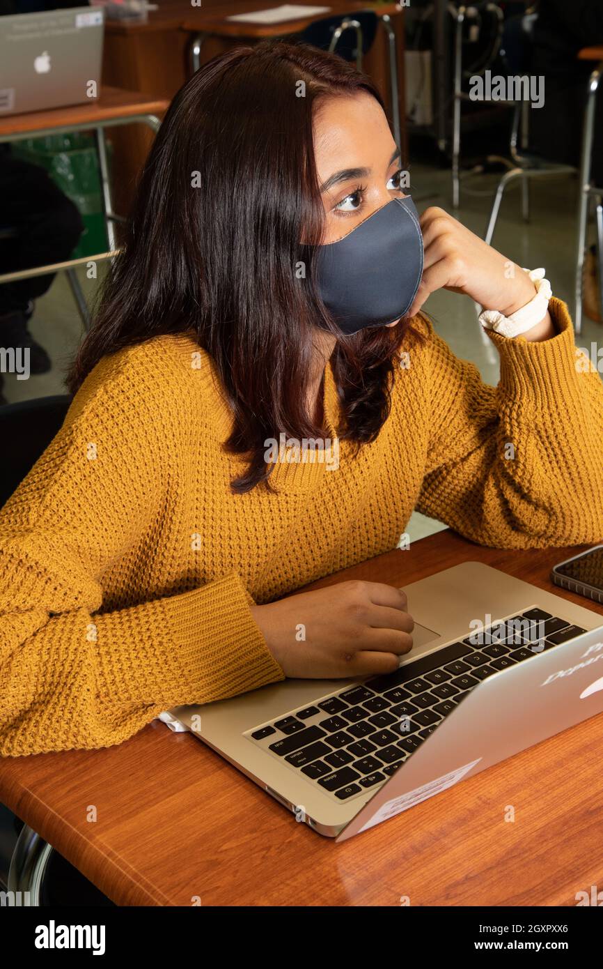 Education High School, classroom scene, female student listening in ...
