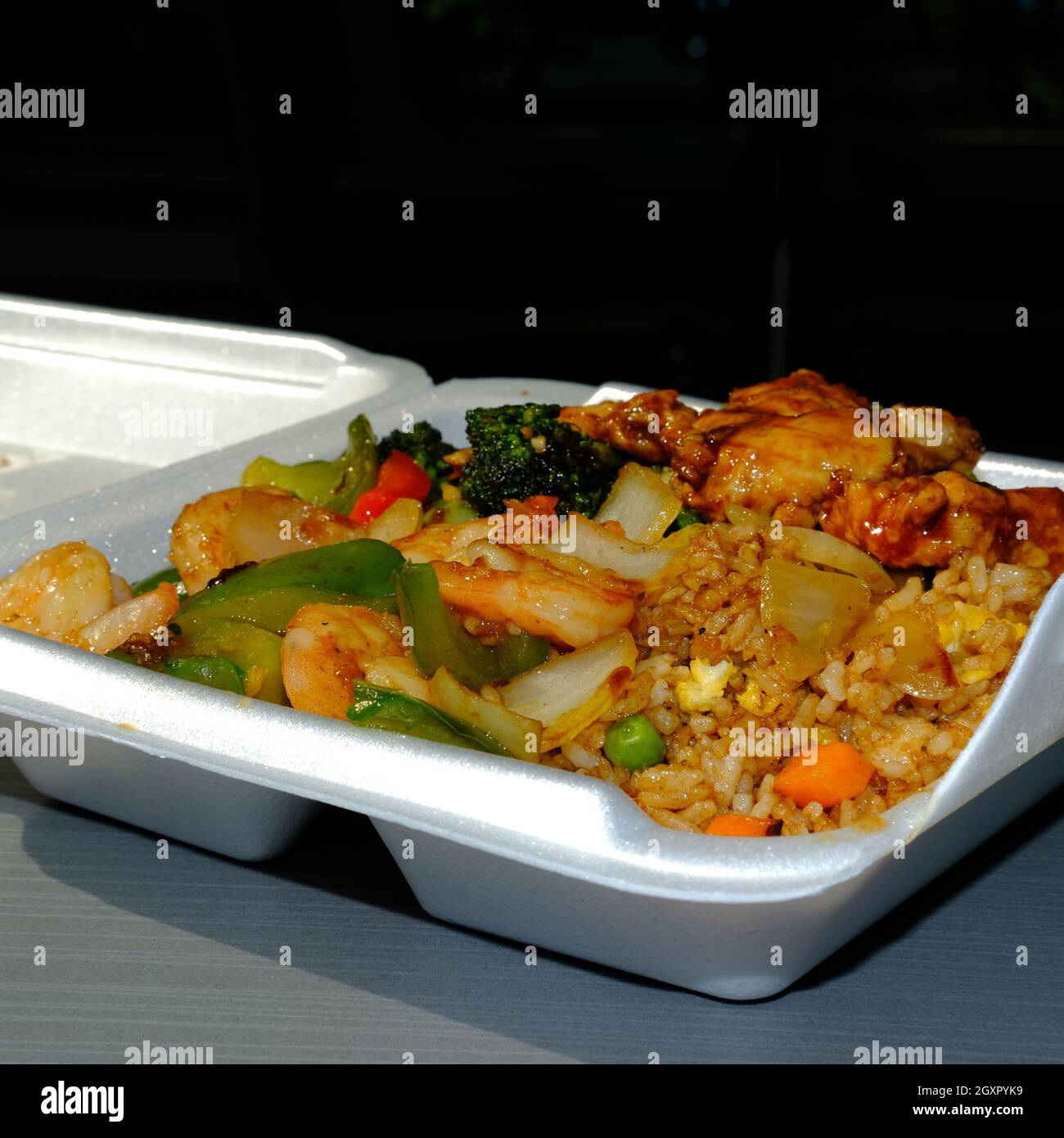 Cafeteria food court chinese food in disposable polystyrene takeout ...