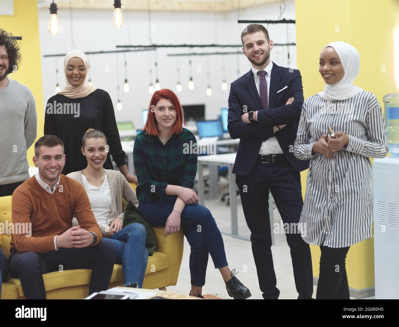 Mixed race Business team portrait at modern startup open space ...