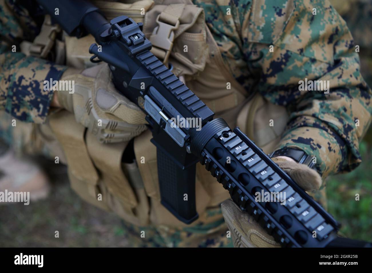 american marine corps special operations soldier preparing tactical and ...