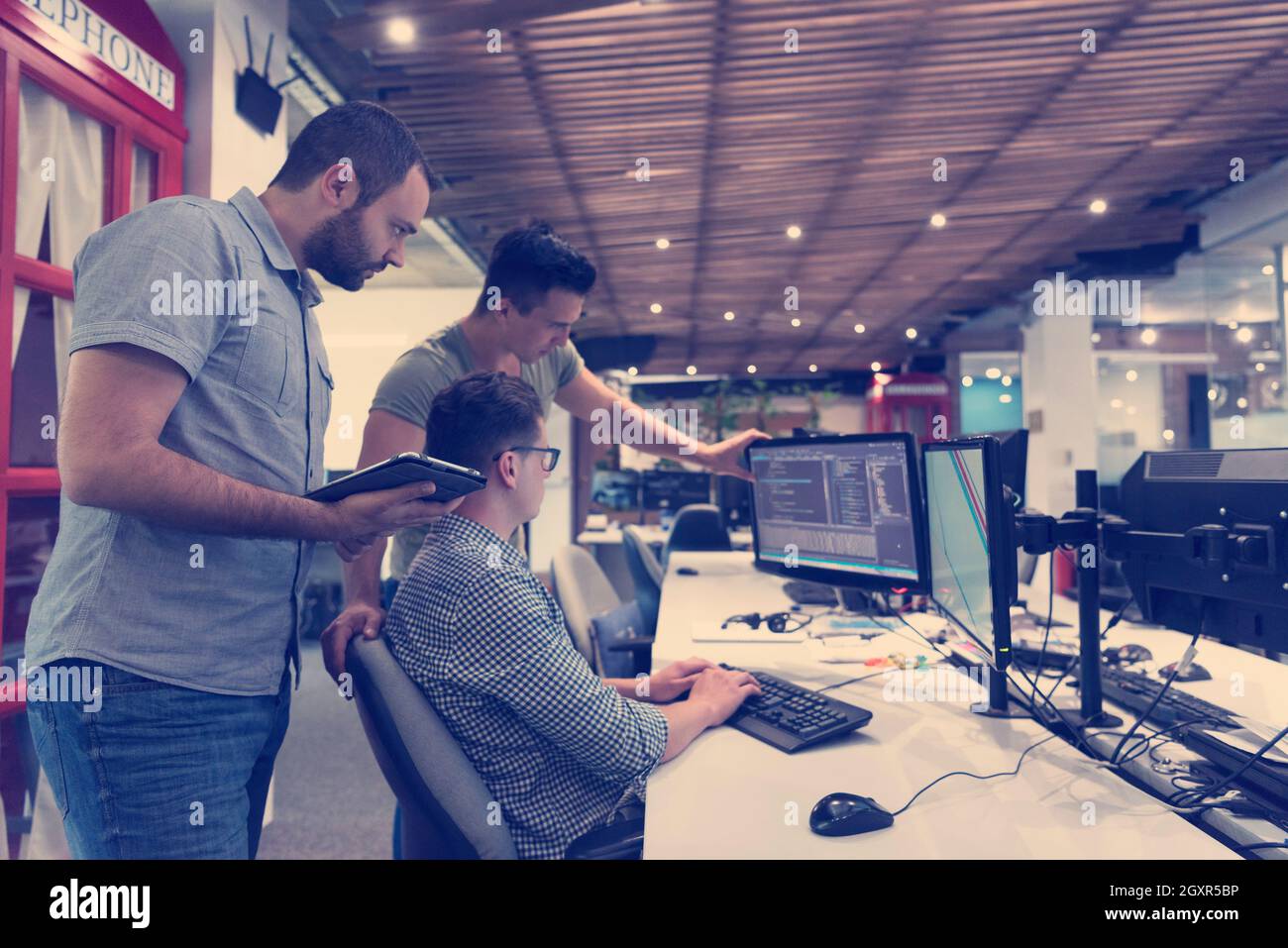 startup business people group working as team to find solution to ...