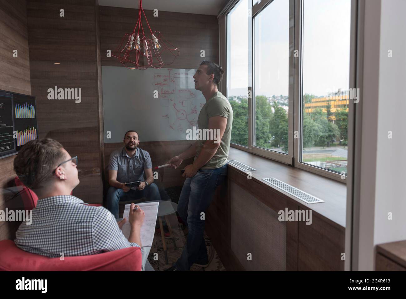 young people group in small private office have team meeting and ...