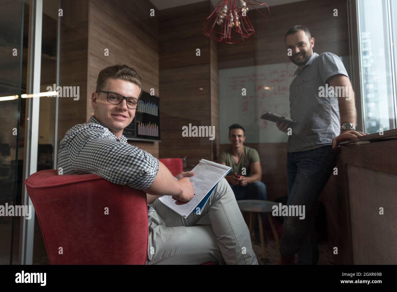 young people group in small private office have team meeting and ...