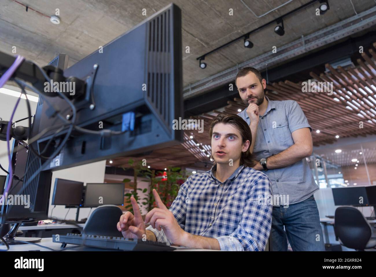 startup business people group working as team to find solution to ...
