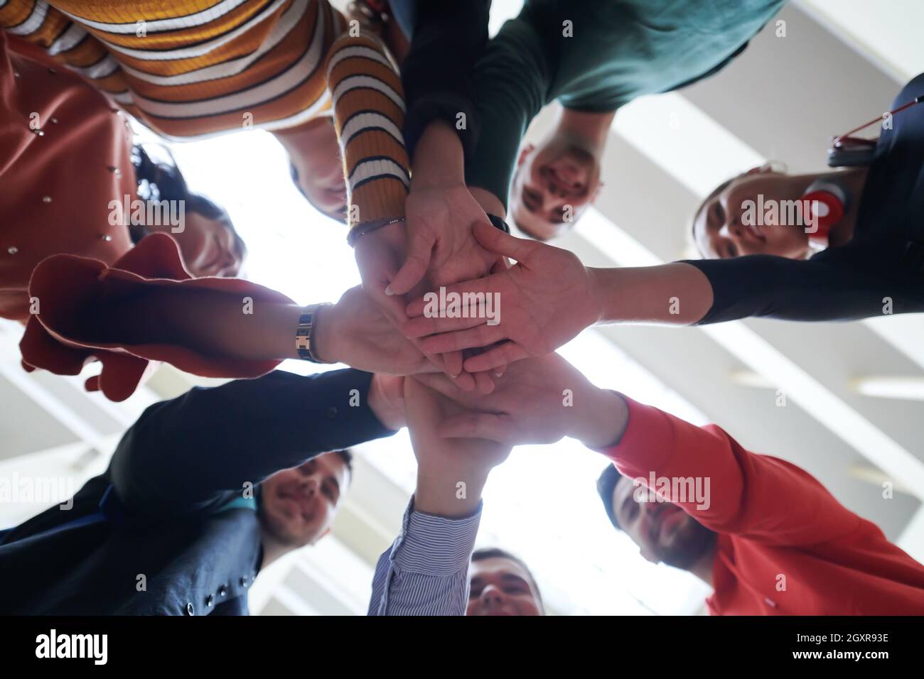 Group of young students in electronics classroom celebrating ...