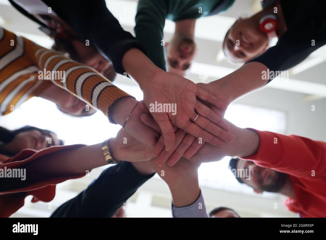 Group of young students in electronics classroom celebrating ...