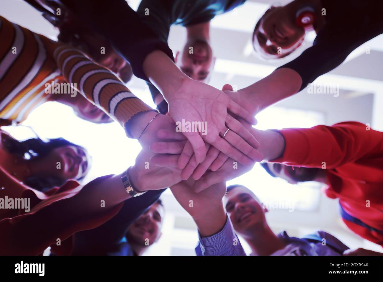 Group of young students in electronics classroom celebrating ...