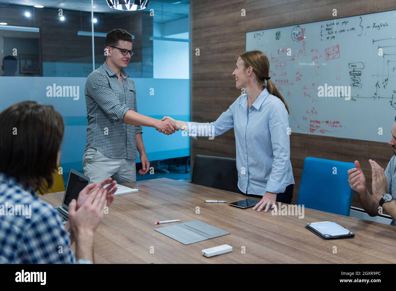 start up business people handshake on team meeting at modern business ...