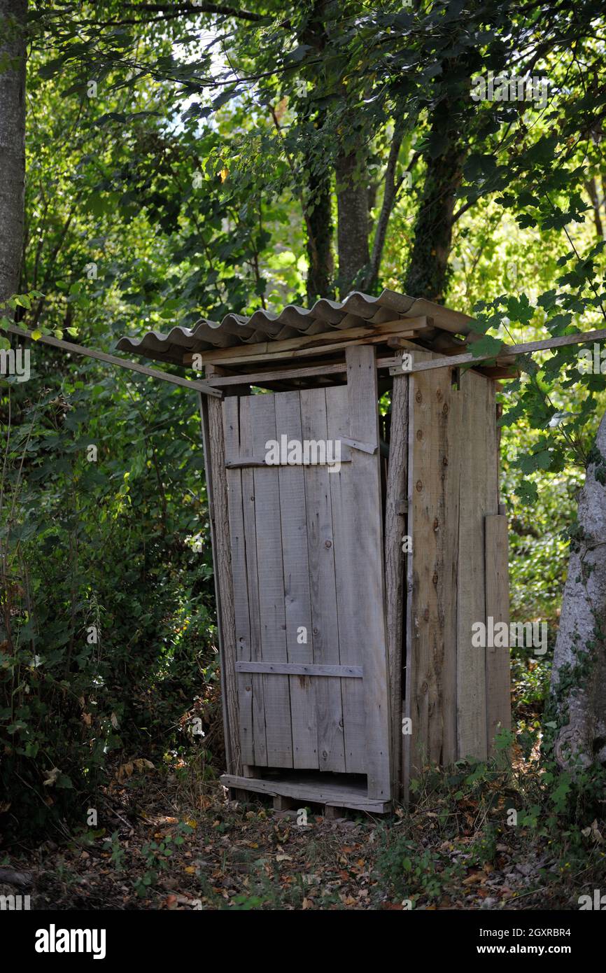 old wooden retro outdoor toilet in forest Stock Photo - Alamy