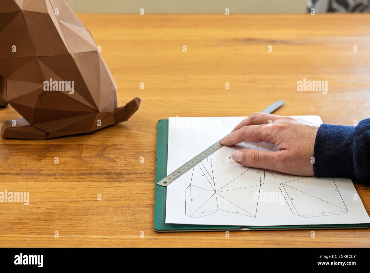 Somebody is making a cube sculpture with paper and linear. DIY Stock ...