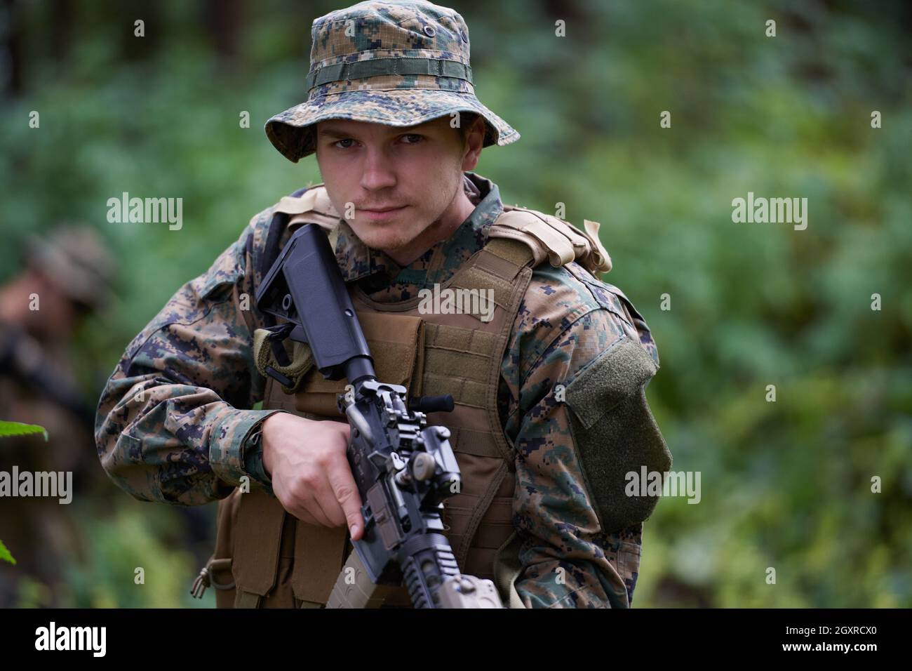Portrait soldier walking rifle hi-res stock photography and images - Alamy