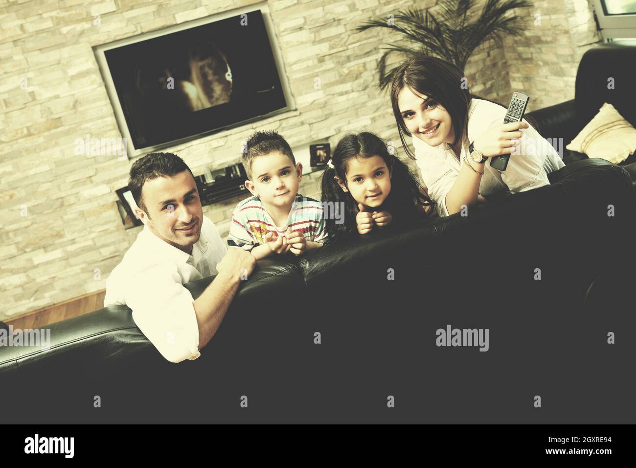 happy young family relax and have fun at modern home indooor Stock ...