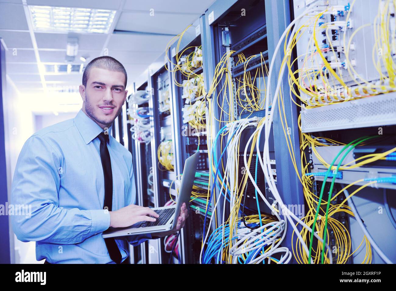 young engeneer business man with thin modern aluminium laptop in ...