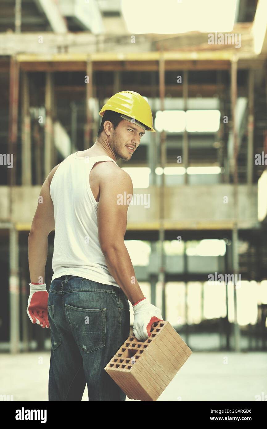 handsome hard worker people portrait at concstruction site Stock Photo ...