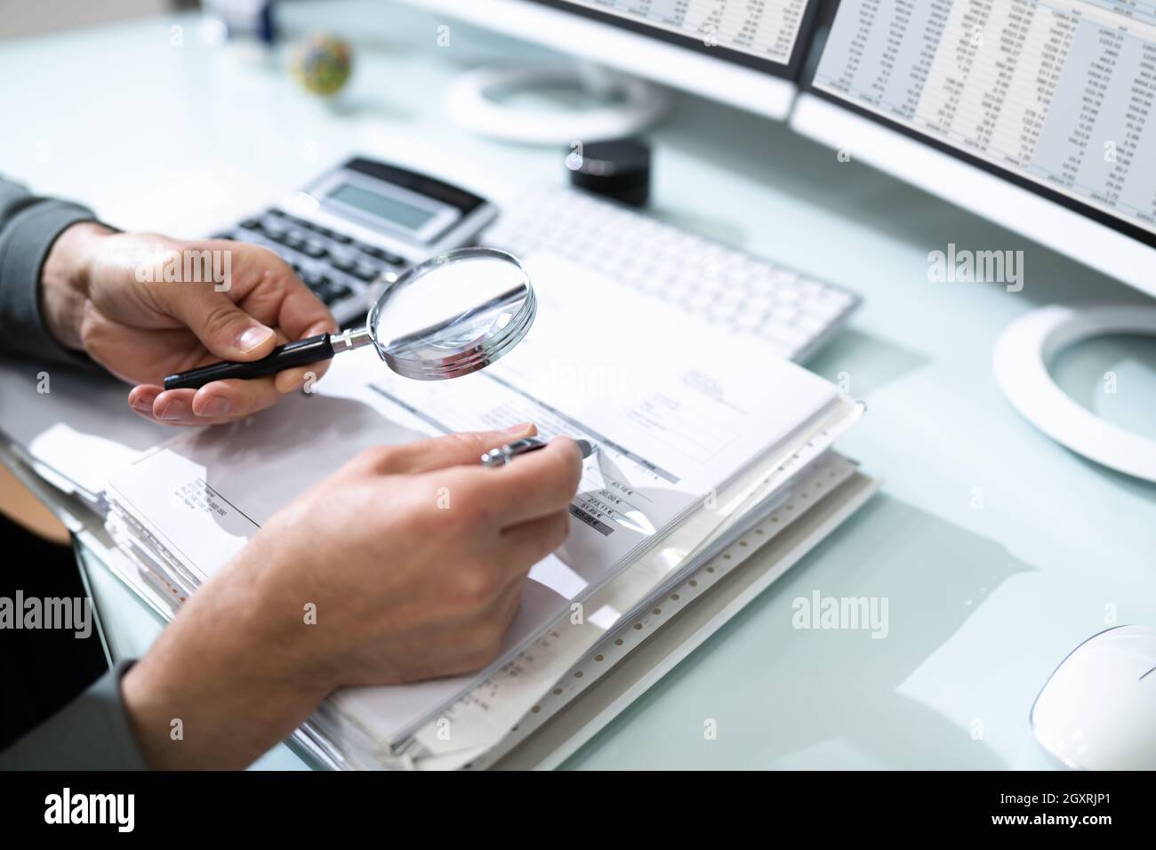 Audit And Fraud Investigation. Auditor Using Magnifying Glass On ...