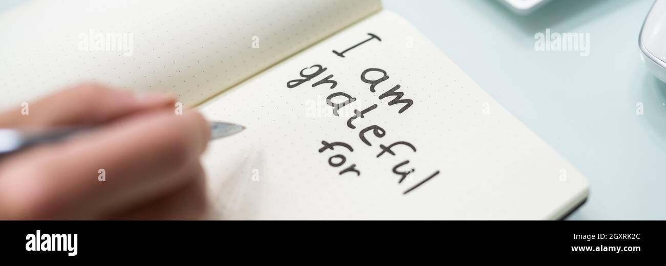 Gratitude Journal Concept. Writing I Am Grateful In Journal Stock Photo ...