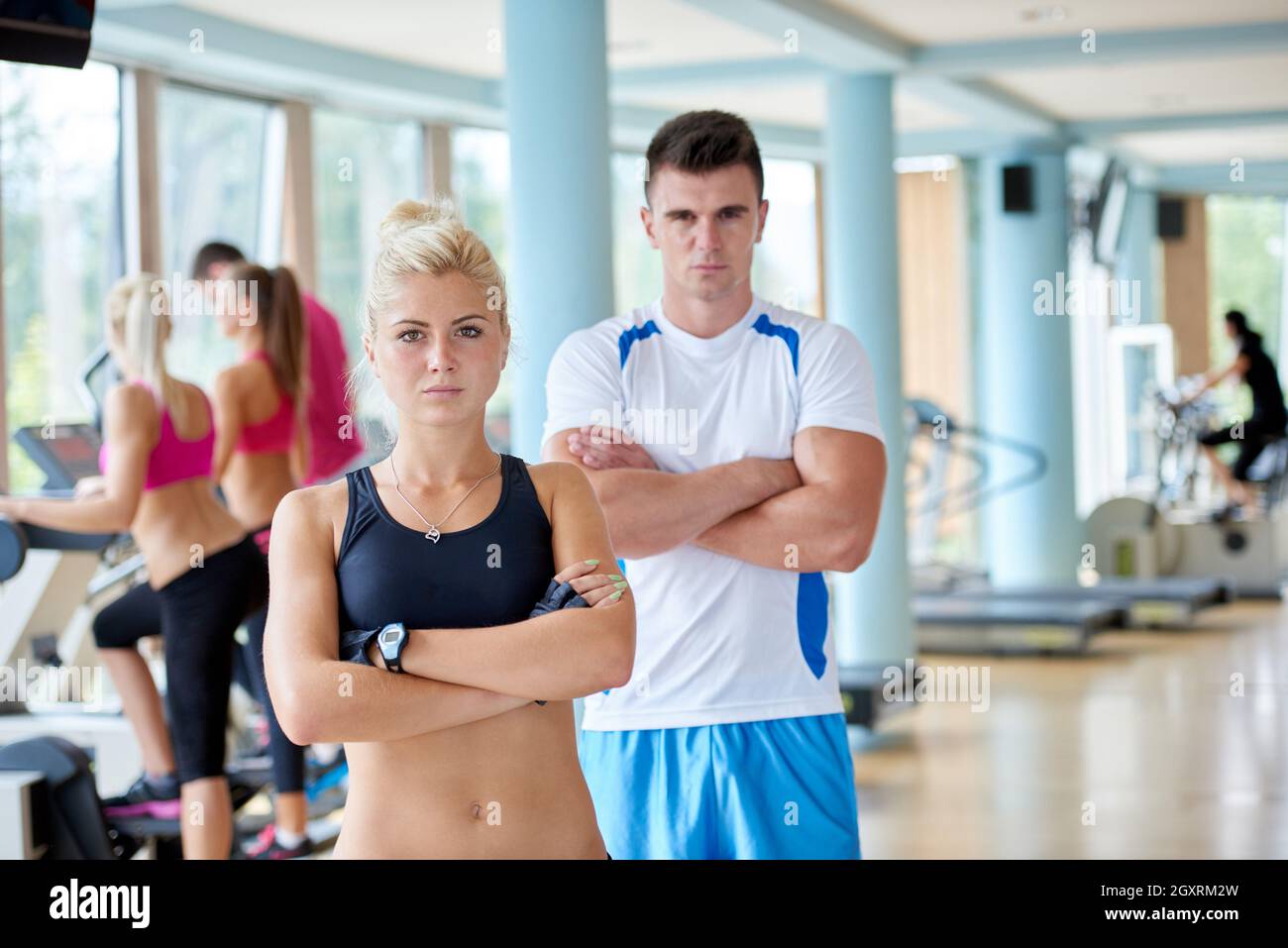 group portrait of healthy and fit young people in fitness gym Stock ...