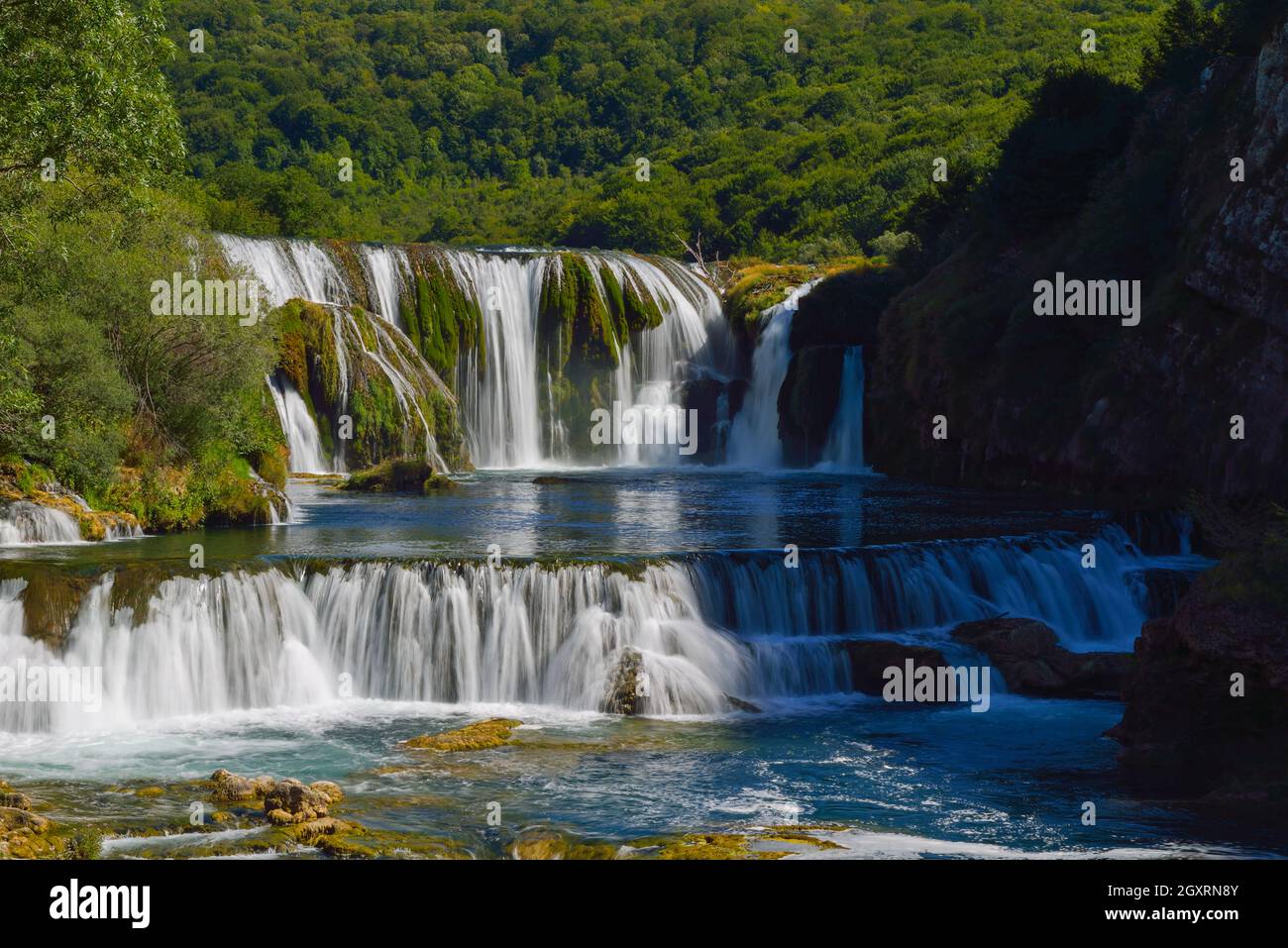 waterfall on wild river with fresh drinking water in summer Stock Photo ...