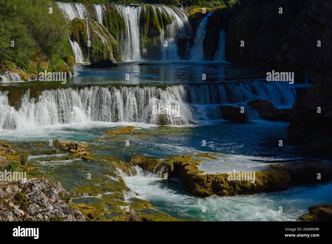 waterfall on wild river with fresh drinking water in summer Stock Photo ...