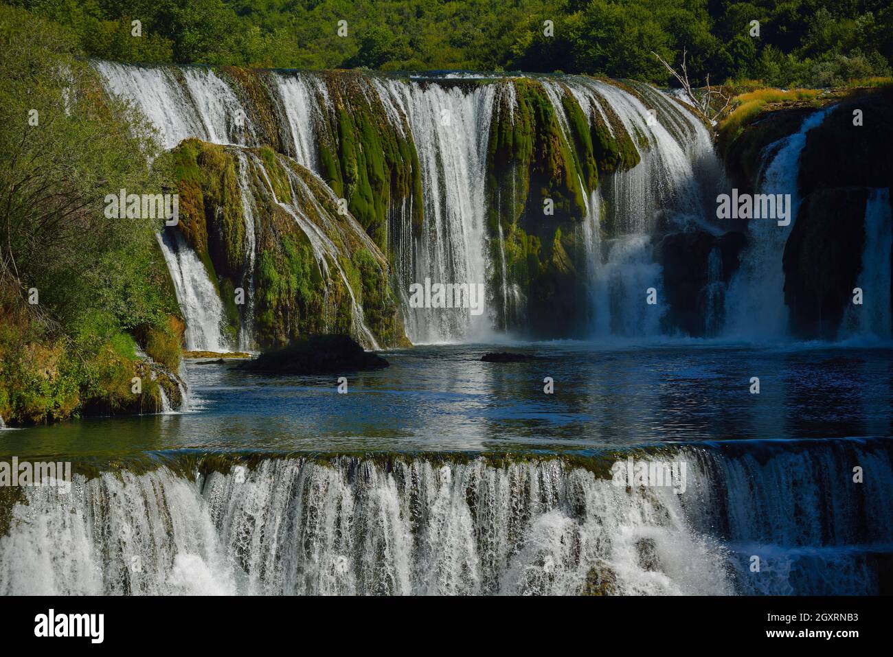 waterfall on wild river with fresh drinking water in summer Stock Photo ...